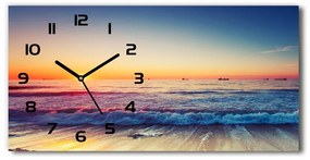 Wallmuralia Skleněné hodiny na stěnu Východ slunce moře 60x30 cm
