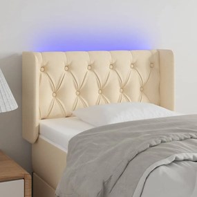 Čelo postele s LED krémové 83 x 16 x 78/88 cm textil