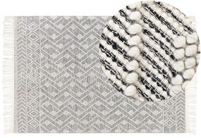 Vlněný koberec 160 x 230 cm černý/bílý KAVAK Beliani