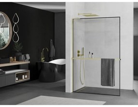 Mexen Kioto+ L, sprchová zástěna Walk-In s poličkou a věšákem 110 x 200 cm, 8mm čiré sklo černý vzor, ​​zlatý lesklý profil, 800-110-123-50-70