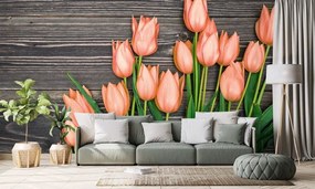 Samolepící fototapeta oranžové tulipány na dřevěném podkladu - 225x150 cm