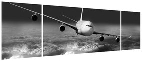 Černobílý obraz letadla v oblacích (170x50 cm)