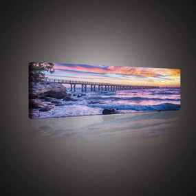 Postershop Obraz na plátně: Západ slunce u moře - 145x45 cm