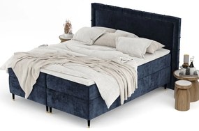 Tmavě modrá boxspring postel s úložným prostorem 180x200 cm Voyage – Maison de Rêve