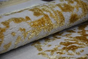 Kusový koberec MANYAS Fegy krémovo-zlatý