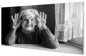 Obraz na skle starší žena 100x50 cm