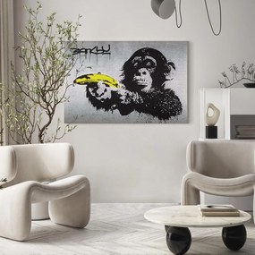 Obraz na akrylovém skle Stůj, nebo opice vystřelí! (Banksy)