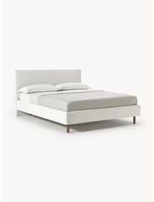 Čalouněná postel's dřevěnými nohami Giulia