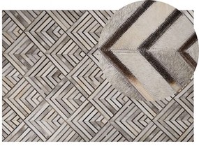Béžový kožený koberec  140 x 200 cm TEKIR Beliani