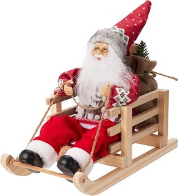 Santa Claus ve skandinávském svetru na saních 34 cm