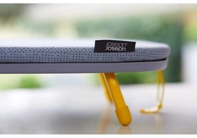 Světle modré stolní žehlicí prkno Joseph Joseph Pocket