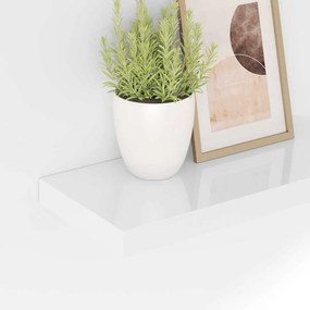 Plovoucí nástěnné police 4 ks bílé vysoký lesk 50x23,5x3,8 cm MDF 323747