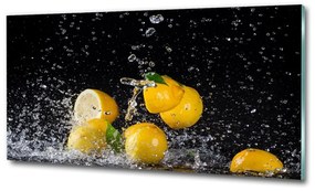 Wallmuralia Foto obraz skleněný horizontální Citrony a voda 100x50