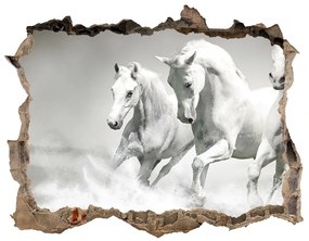 Wallmuralia Díra 3D fototapeta na stěnu Bílí koně 95x64 cm