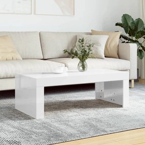 Konferenční stolek lesklý bílý 102x50x36 cm kompozitní dřevo
