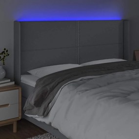 Čelo postele s LED světle šedé 183x16x118/128 cm textil 3123922
