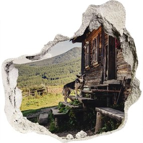 Wallmuralia Díra 3D ve zdi nálepka Dřevěný dům hory 75x75 cm