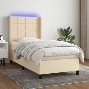 Box spring postel s matrací a LED krémová 90x200 cm textil