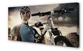 Obrazy na plátně Cyklista na kole mraky 120x60 cm