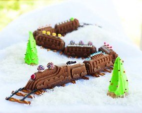 Nordic Ware Forma na bábovku Polární expres plát se 7 formičkami zlatá