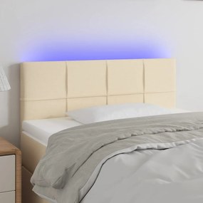 Čelo postele s LED krémové 100x5x78/88 cm textil