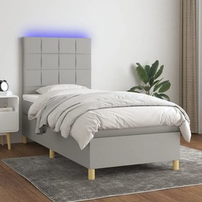 Box spring postel s matrací a LED světle šedá 90x200 cm textil