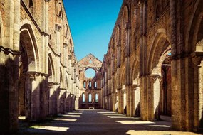 DIMEX | Vliesová fototapeta Starověké opatství San Galgano MS-5-0989 | 375 x 250 cm| modrá, hnědá