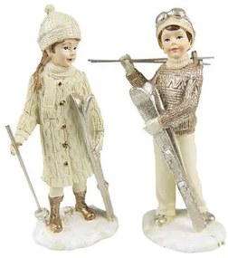 Děvčátko a chlapec s lyžemi