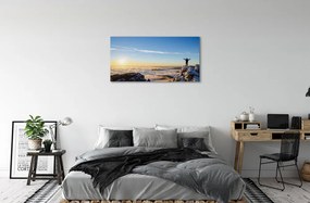 Obrazy na plátně Mountain muž mraky východ 120x60 cm