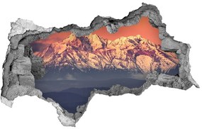 Wallmuralia Díra 3D ve zdi nálepka Východ slunce Tatry 95x73 cm