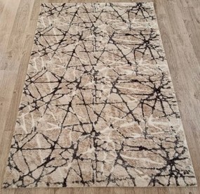 HU Béžový koberec Plush Deluxe Béžovo-mramorový Rozměr: 50x80 cm