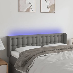 Čelo postele s LED tmavě šedé 147 x 16 x 78/88 cm textil 3123669