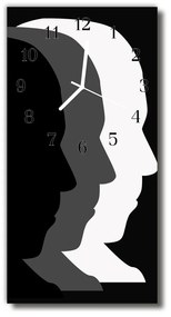Nástěnné hodiny vertikální Tváře barevného muže