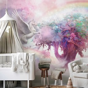 Fototapeta Jednorožec a kouzelný strom - růžová a duhová krajina v oblacích