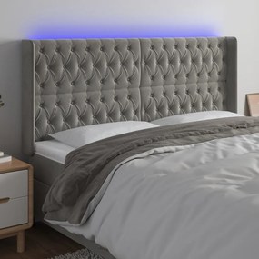 Čelo postele s LED světle šedé 203 x 16 x 118/128 cm samet