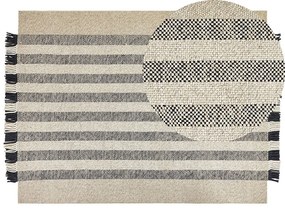 Vlněný koberec 160 x 230 cm černý/krémově bílý TACETTIN Beliani