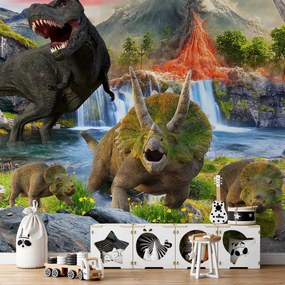 Fototapeta Realistické dinosaury - ještěři na pozadí krajiny s sopkou a vodopádem