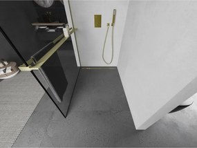 Mexen Kioto+ L, sprchová zástěna Walk-In s poličkou a věšákem 100 x 200 cm, 8mm čiré sklo černý vzor, ​​zlatý matný profil, 800-100-123-55-70