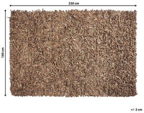 Béžový shaggy kožený koberec 160x230 cm MUT Beliani