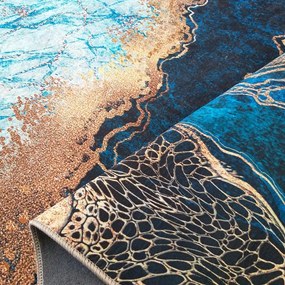 Protiskluzový koberec v modré barvě s abstraktním vzorem Šířka: 80 cm | Délka: 150 cm