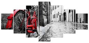 Obraz červeného kola na dlážděné ulici (210x100 cm)