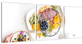 Obraz talířů s ovocem na stole (s hodinami) (90x30 cm)
