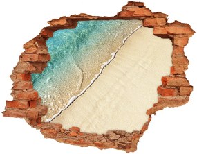 Wallmuralia Díra 3D ve zdi nálepka Vlna na pláži 90x70 cm