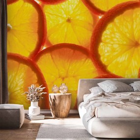 Fototapeta Pomerančové plátky - motiv ovoce na slunci do kuchyně nebo pokoje