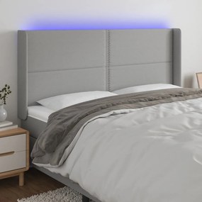 Čelo postele s LED světle šedé 183x16x118/128 cm textil 3123922