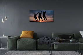 Obrazy na plátně Lidé mraky západ 120x60 cm