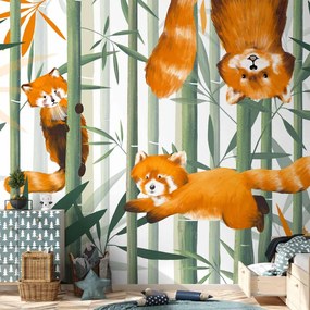 Fototapeta Veselé červené pandy - zvířata mezi bambusy a listy pro děti