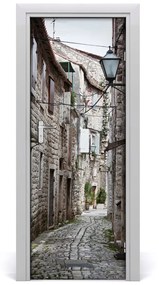 Fototapeta samolepící dveře ulička Chorvatsko 75x205 cm
