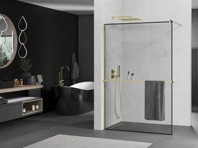 Mexen Kioto+, sprchová zástěna s poličkou a držákem na ručníky 110 x 200 cm, 8mm čiré sklo vzor černý rám, zlatý profil, 800-110-121-50-70