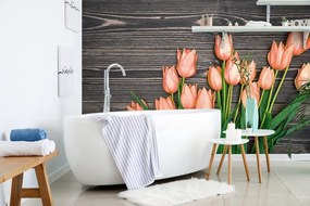 Samolepící fototapeta oranžové tulipány na dřevěném podkladu - 375x250 cm